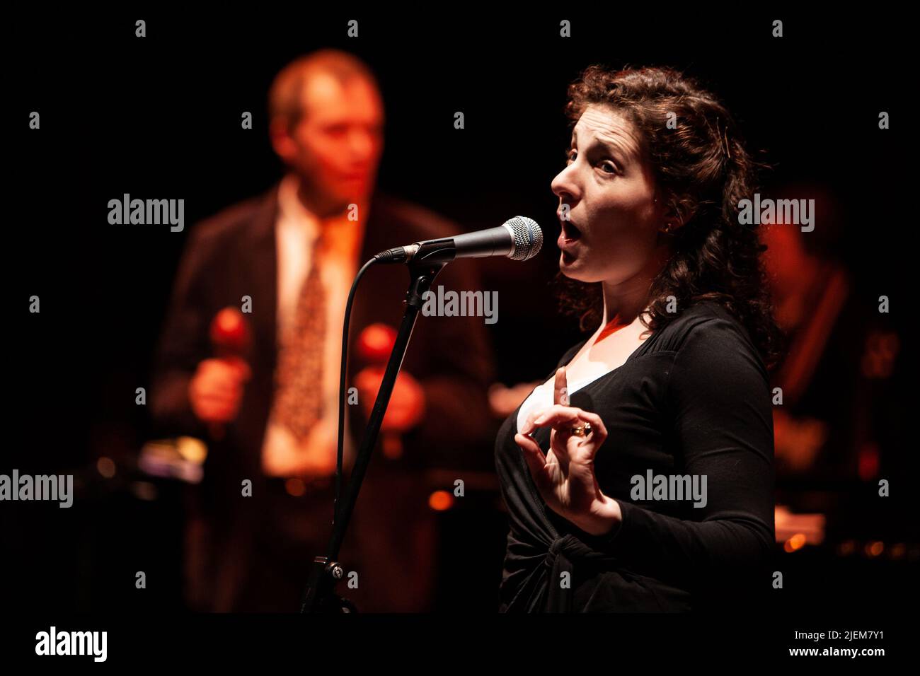 Big Band: a jazz singer in the spotlight. A spot lit vocalist with ...