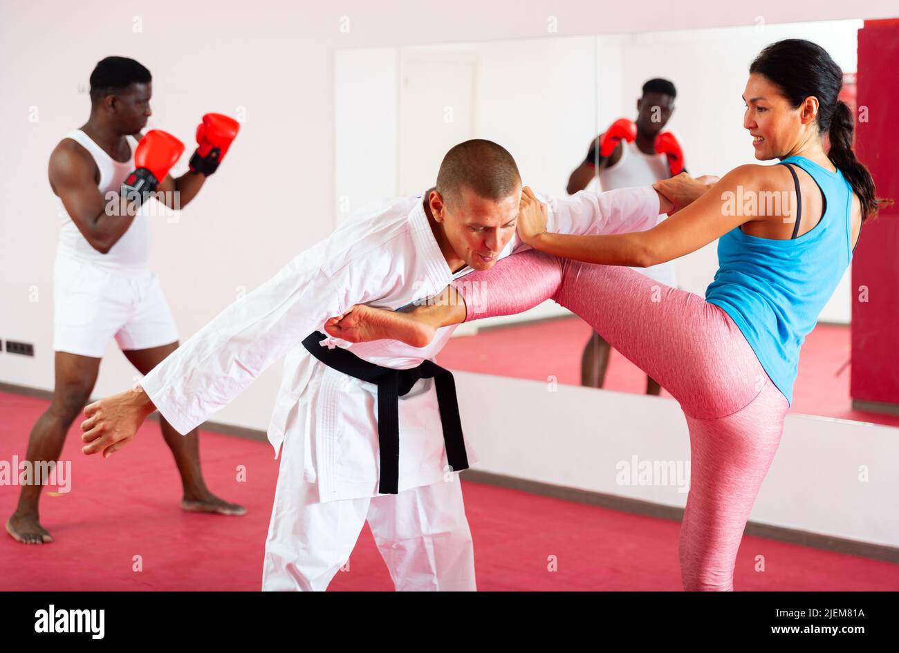 Self-defense lesson for women in gym. Power grabs and strikes Stock ...