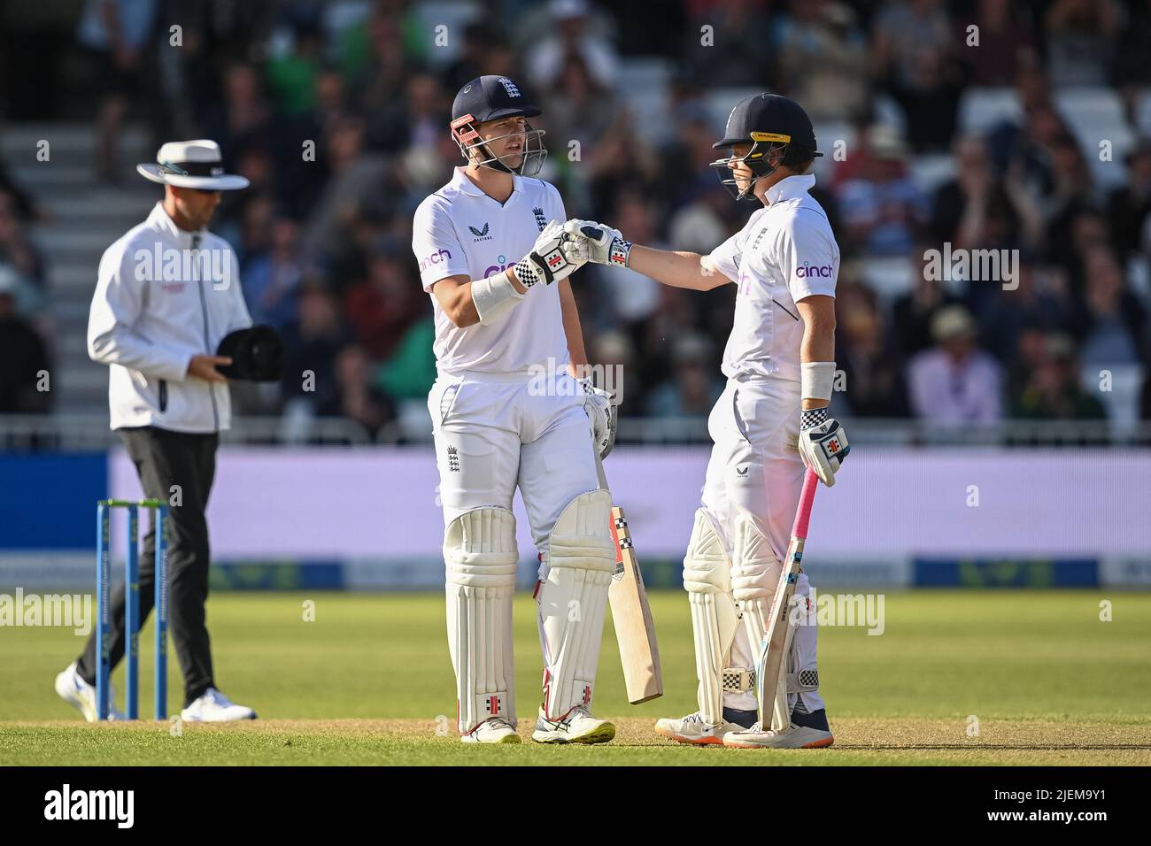Alex Lees of England congratulates Ollie Pope of England after notching ...