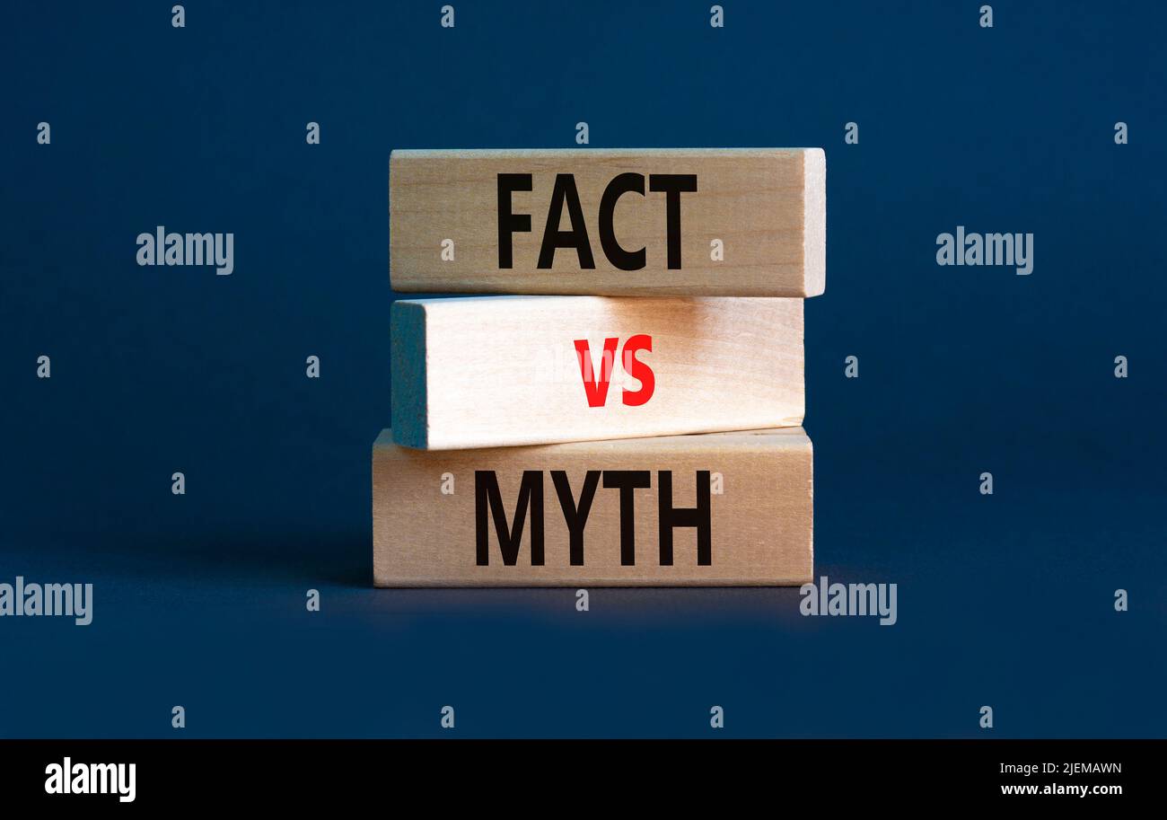 Fact vs myth symbol. Concept words Fact vs myth on wooden blocks on a ...