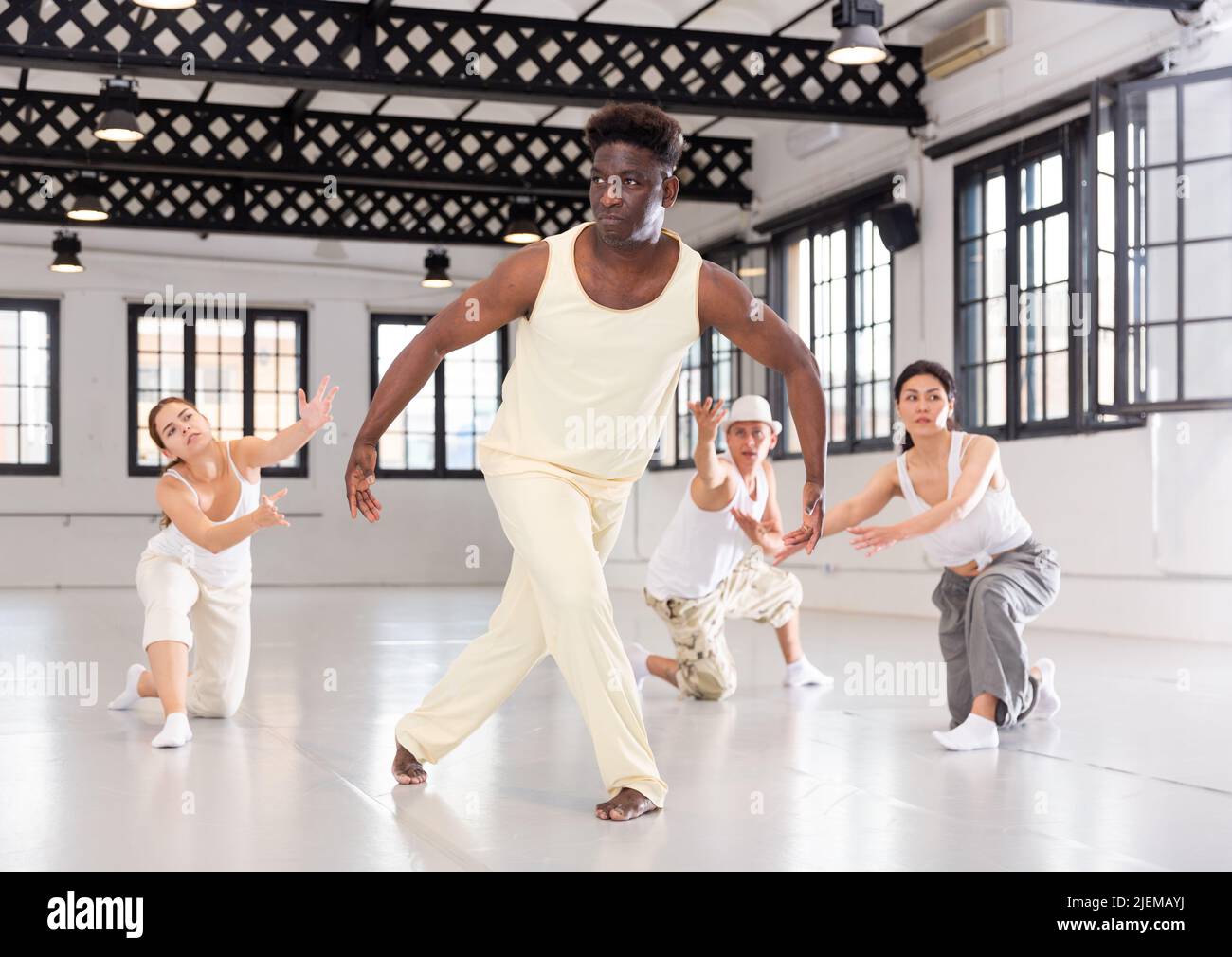 Group of artists rehearsing spectacle scene Stock Photo - Alamy