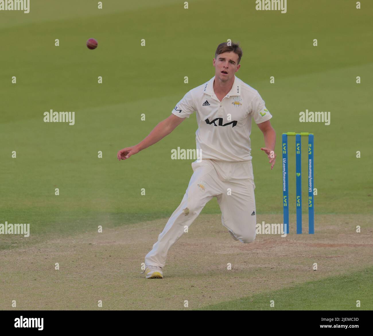 27 June, 2022. London, UK. Surrey’s Tom Lawes bowling as Surrey take on ...