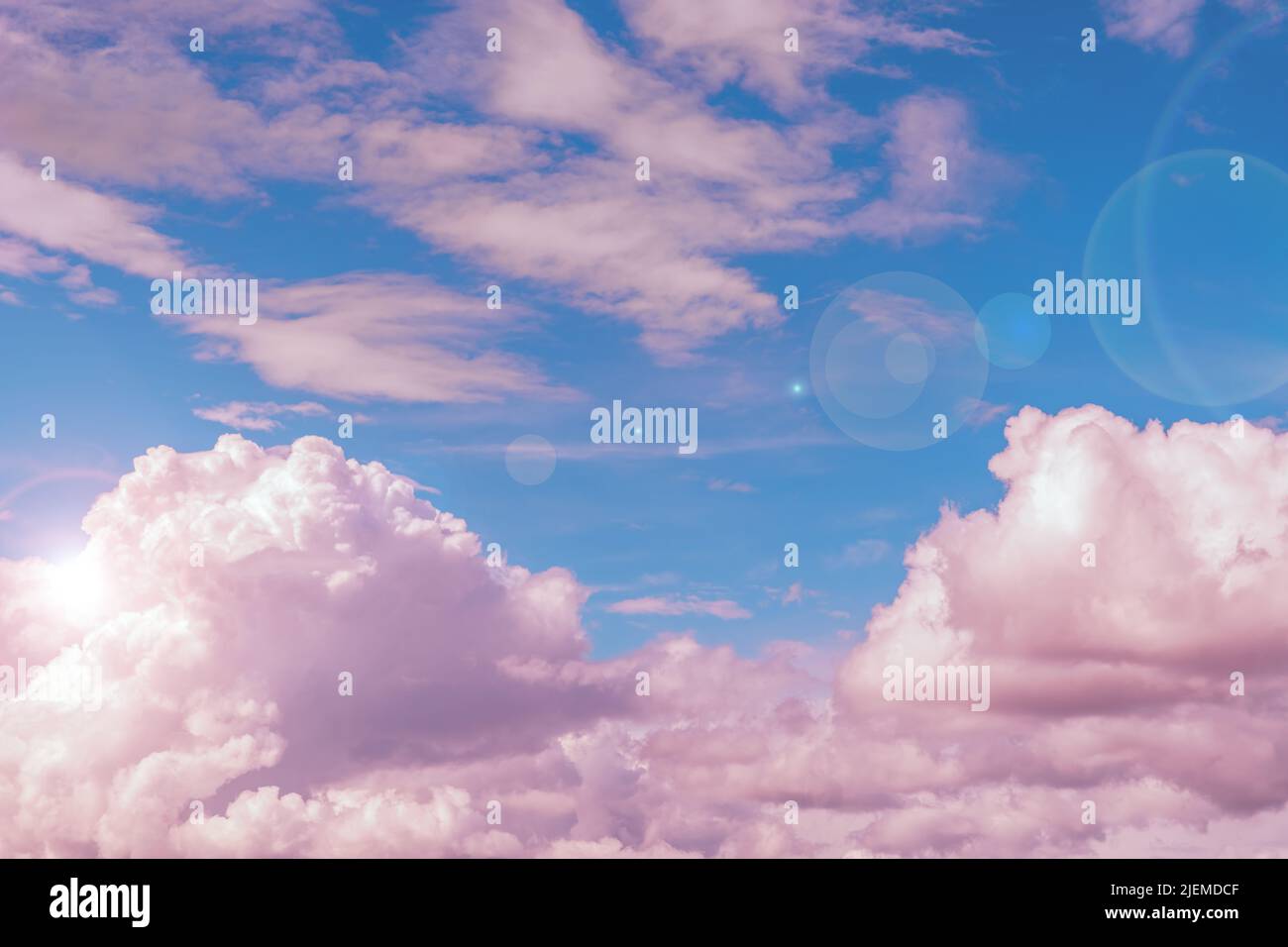 beautiful cumulus pink clouds at sunset. natural background Stock Photo ...