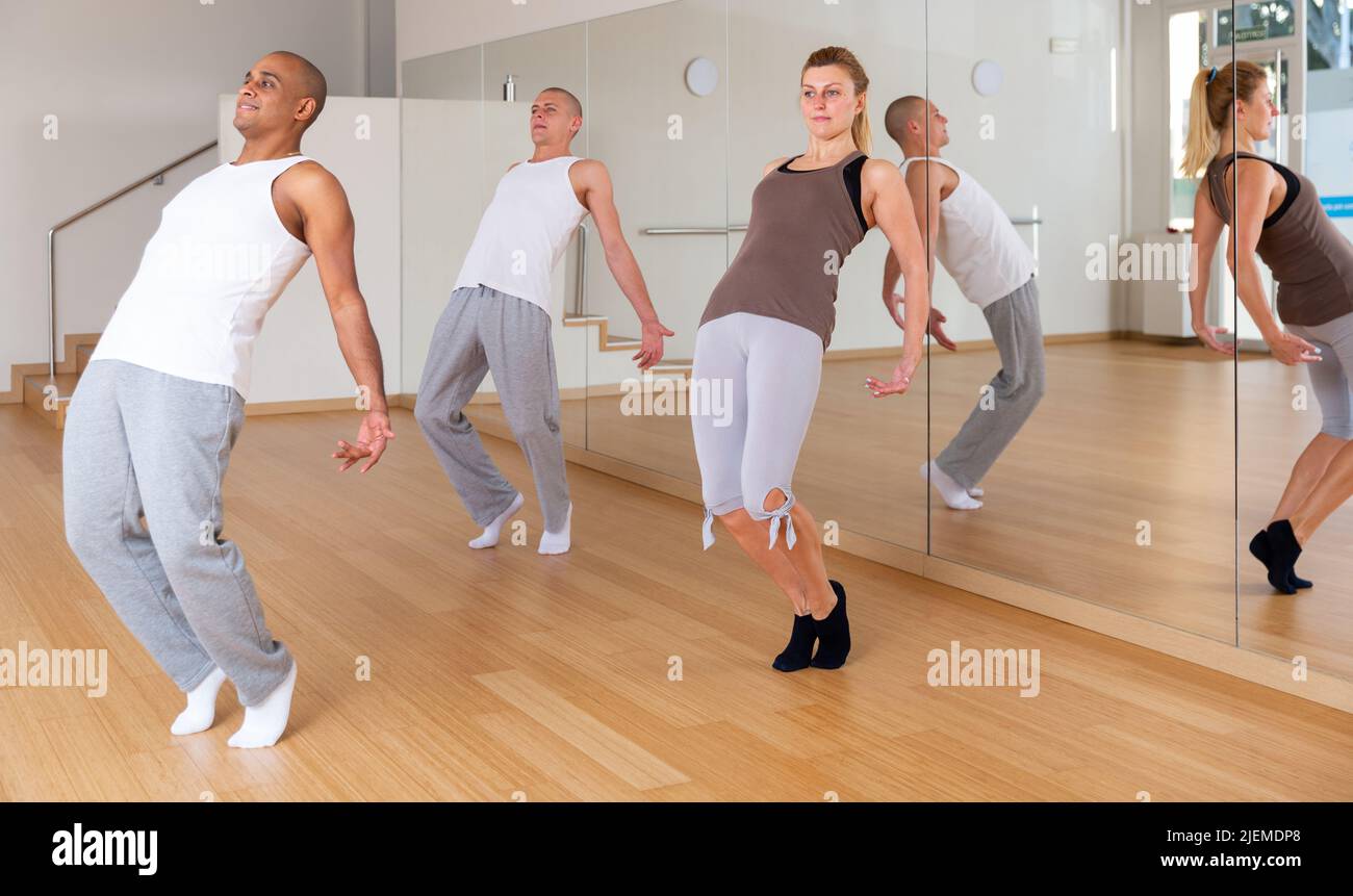 Man dancing at group lesson in studio Stock Photo - Alamy