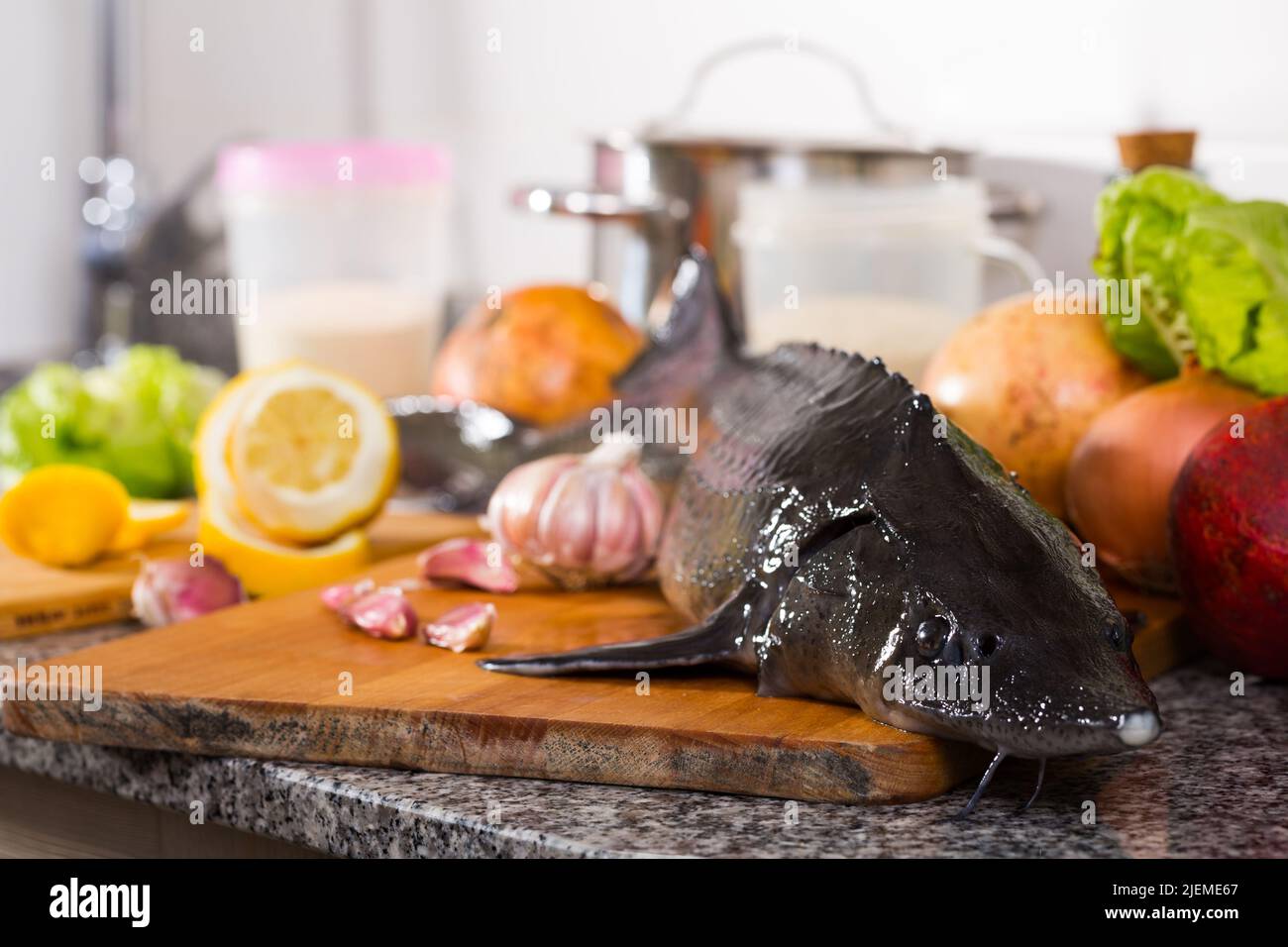 Sturgeon fish with fresh fruits and vegetables Stock Photo - Alamy