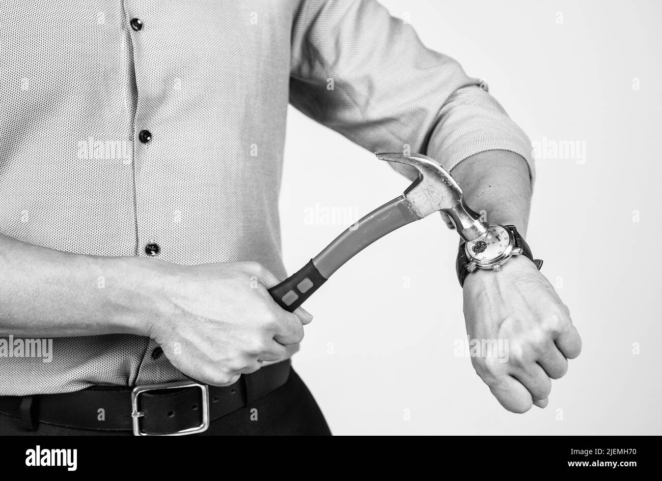 Man cropped view break wrist watch device with claw hammer tool, kill ...