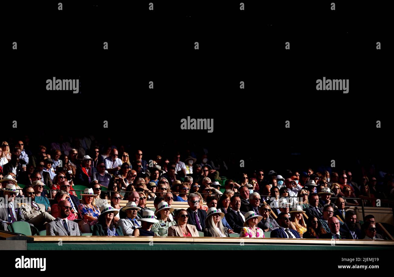 The Royal Box guests wearing hats as they shield from the sun on day ...