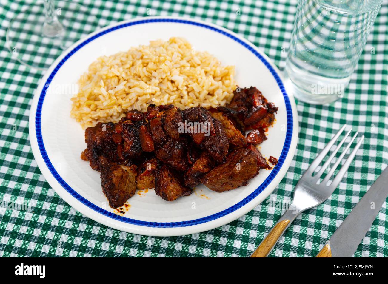 Homemade tasty grilled beef stroganoff with basmati rice Stock Photo ...
