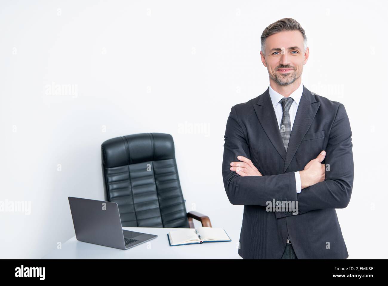 smiling businessman wear suit in boss office on white background Stock ...