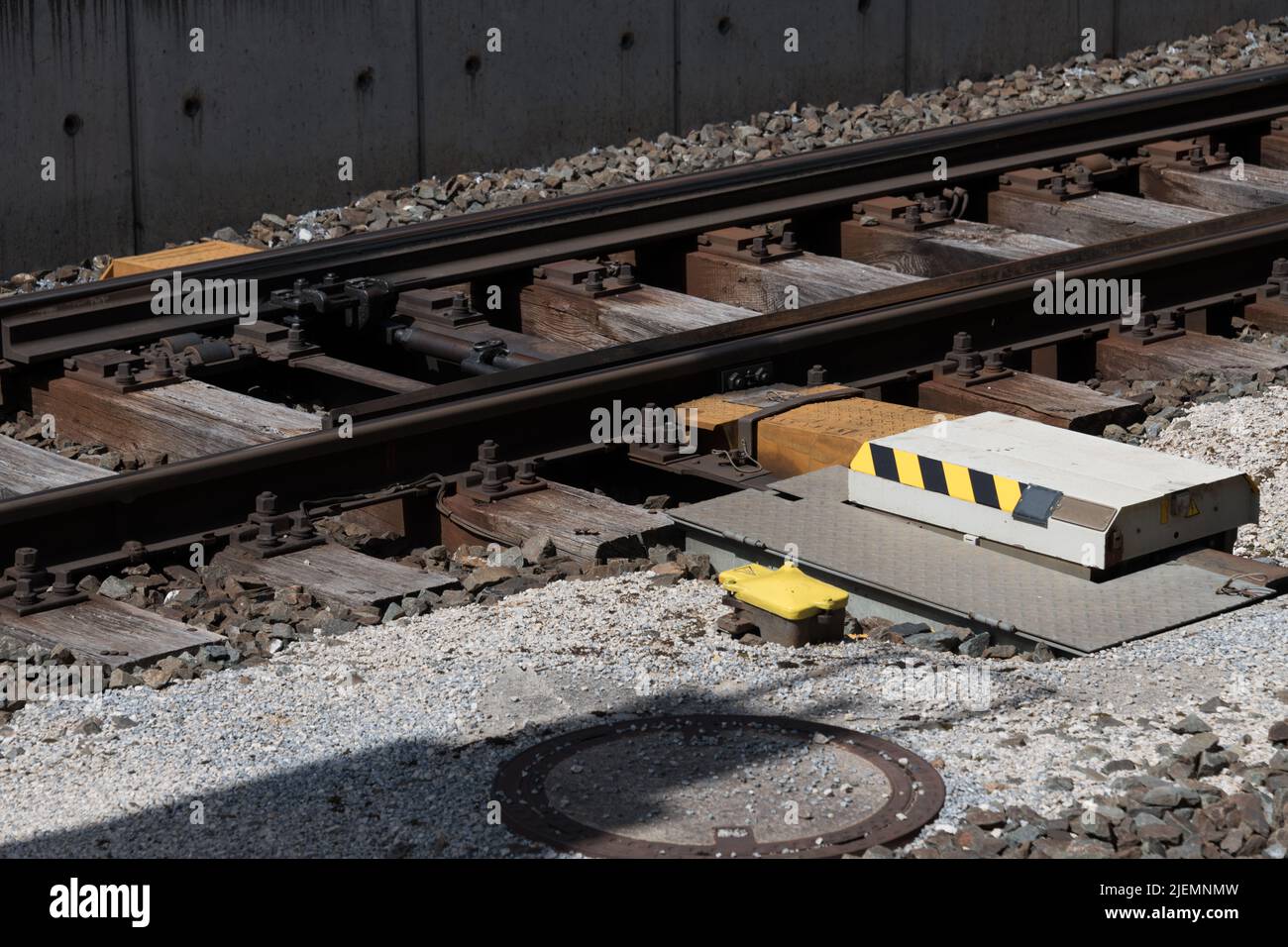 Close up of railroad track with remote controlled automatic electric ...