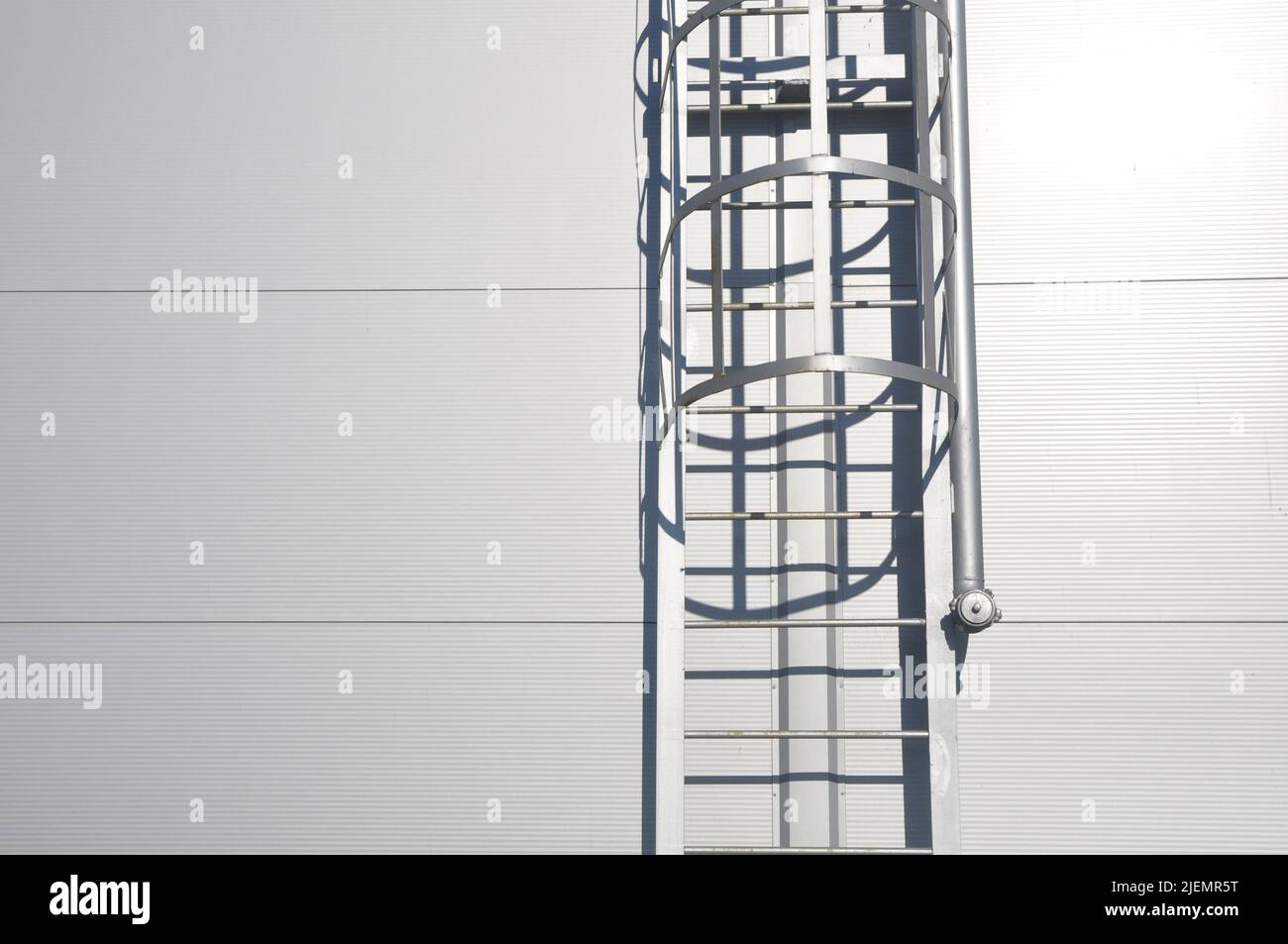 a fire escape leading to the roof of a building made of metal ...