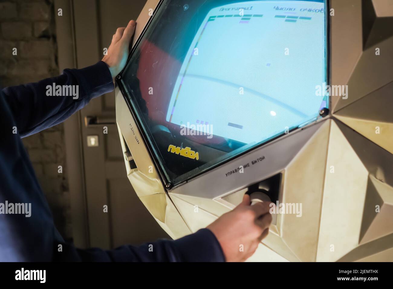 Man gamer hands playing soviet retro arkanoid arcade machine game Stock ...