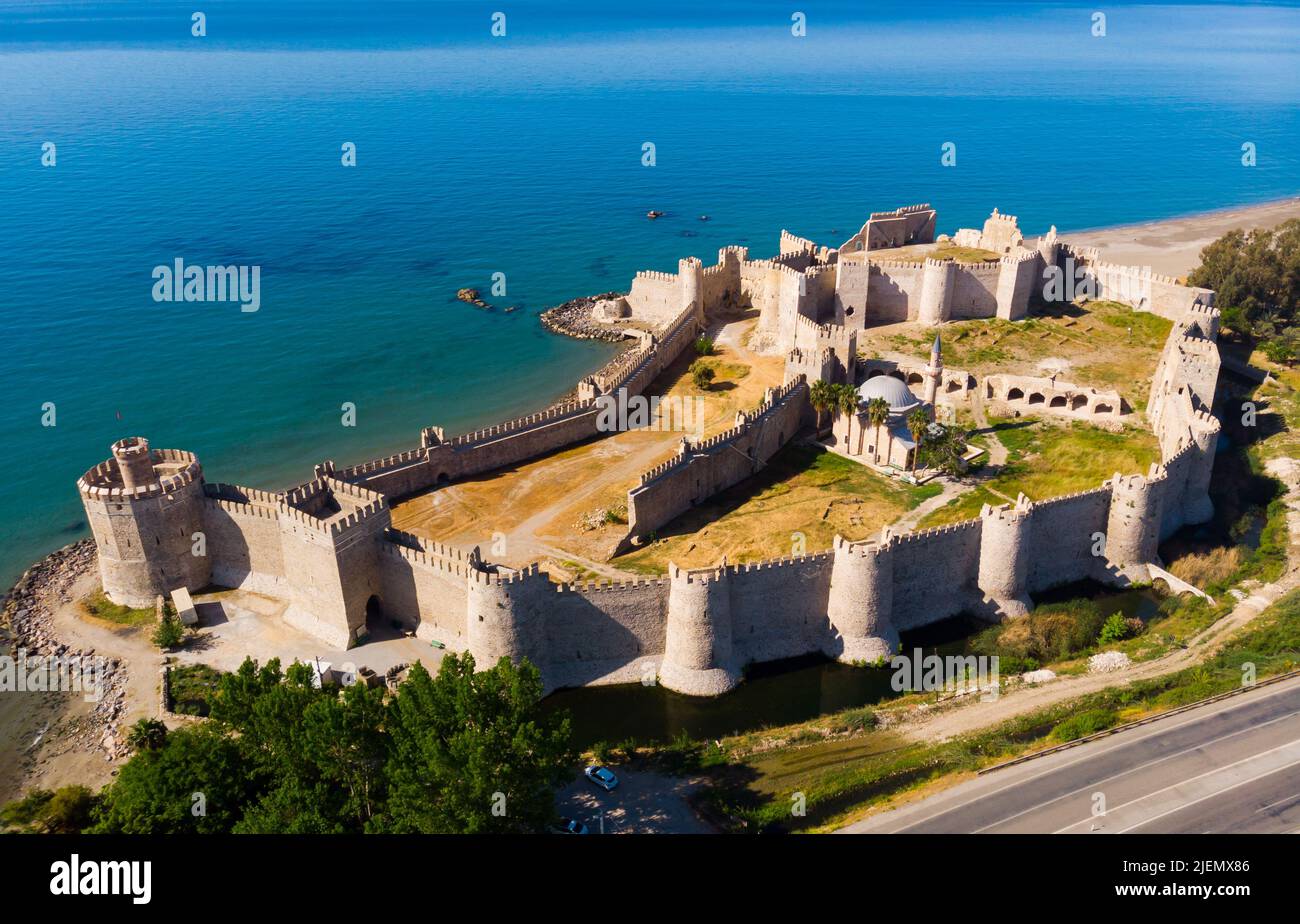 Aerial view of ancient Mamure Castle on Mediterranean coast, Turkey ...