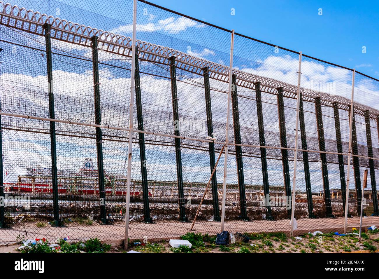 Fence that separates the city of Melilla from the Moroccan port of ...