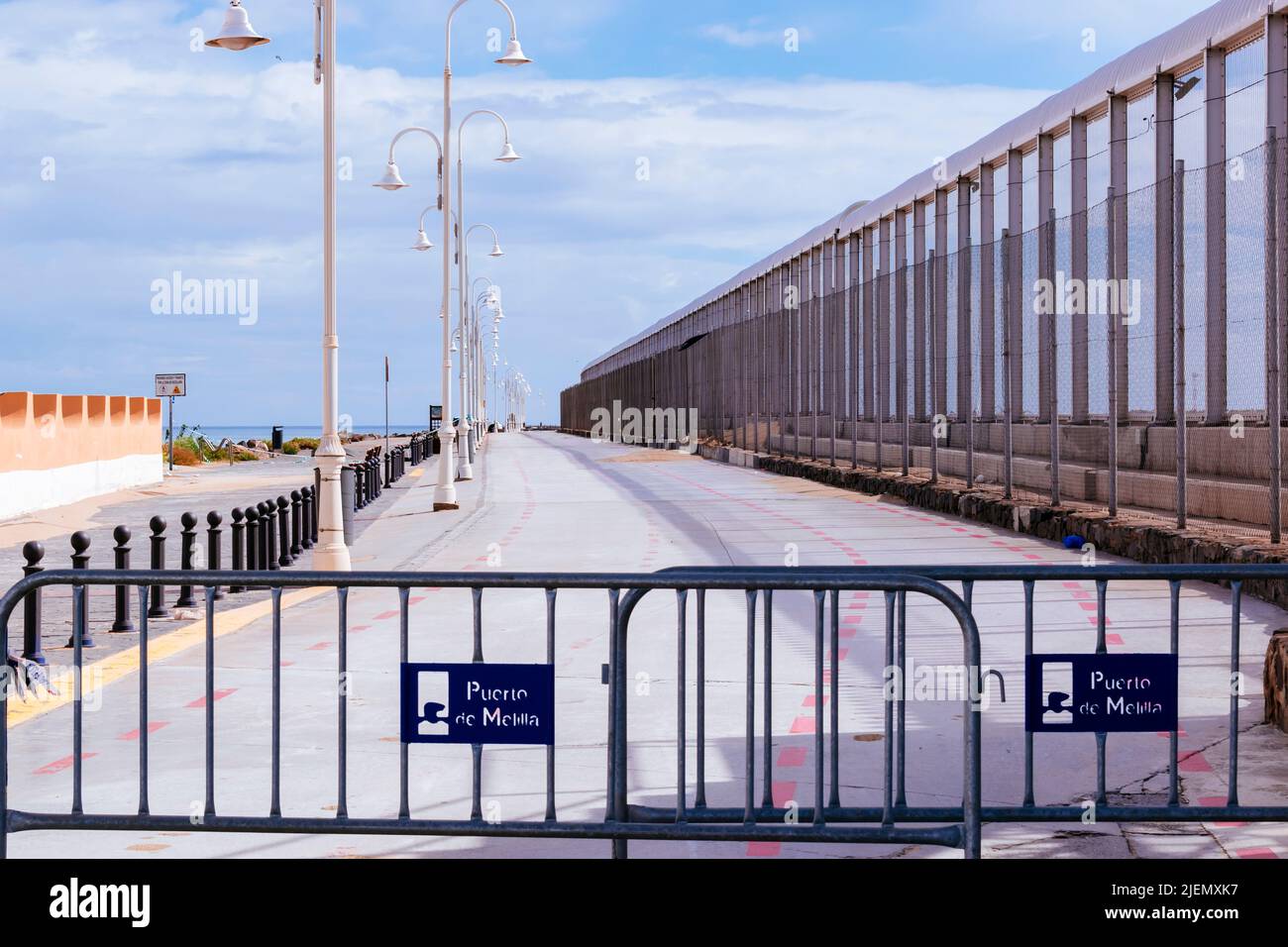 Fence that separates the city of Melilla from the Moroccan port of ...