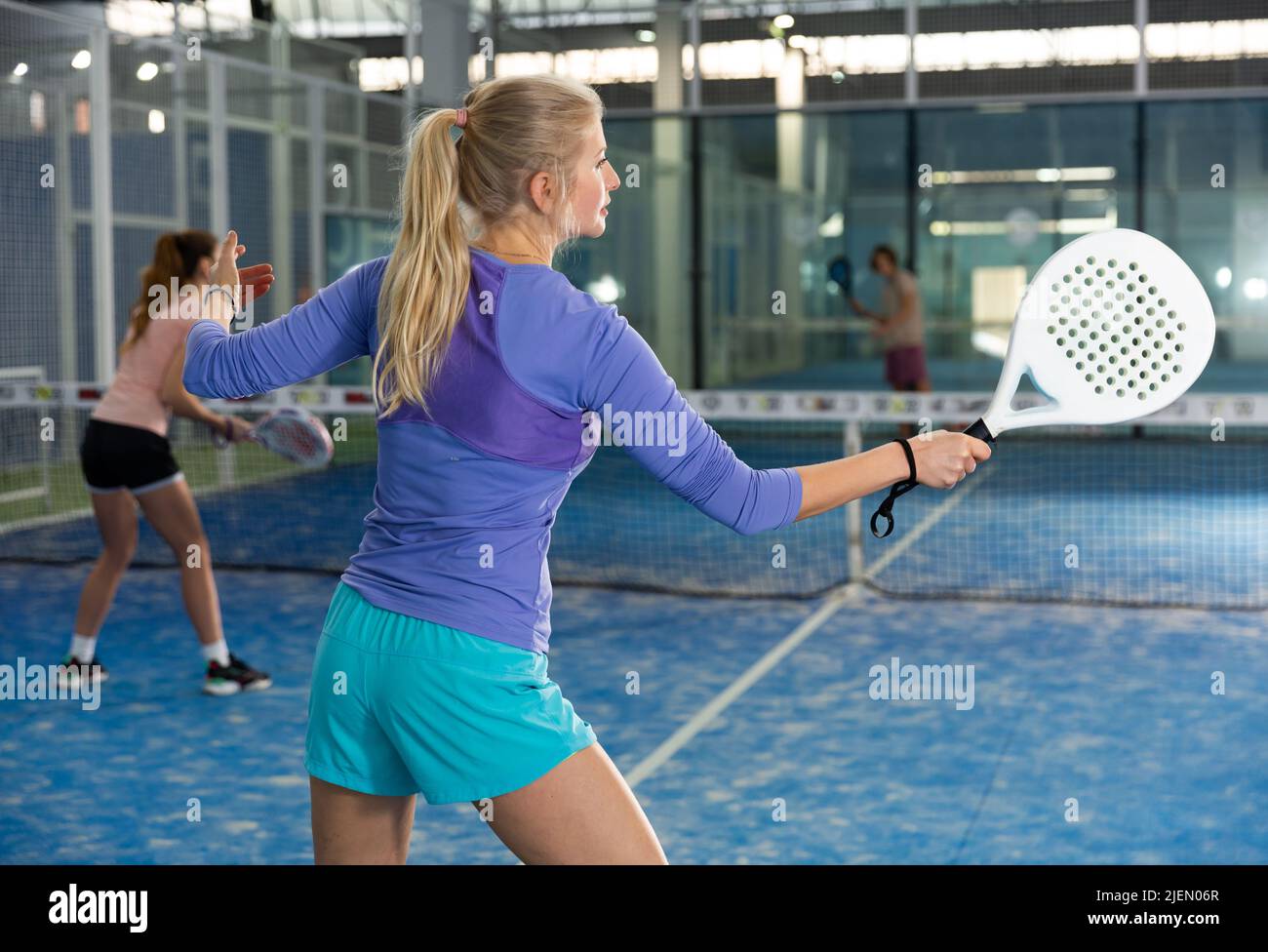 European woman playing padel Stock Photo - Alamy