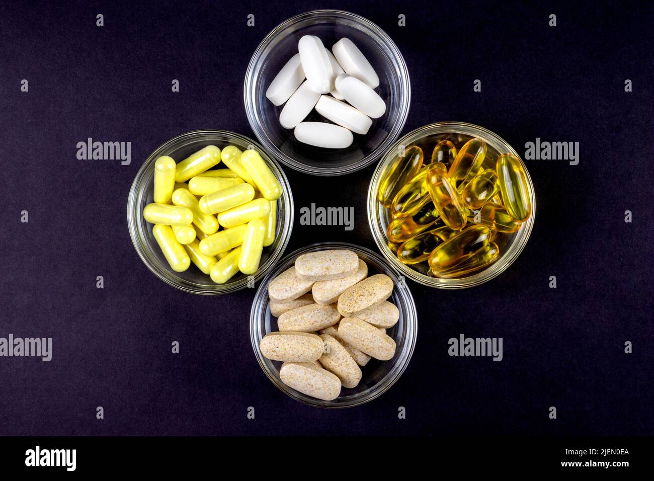 Four different types of herbal sport supplements in capsules and ...