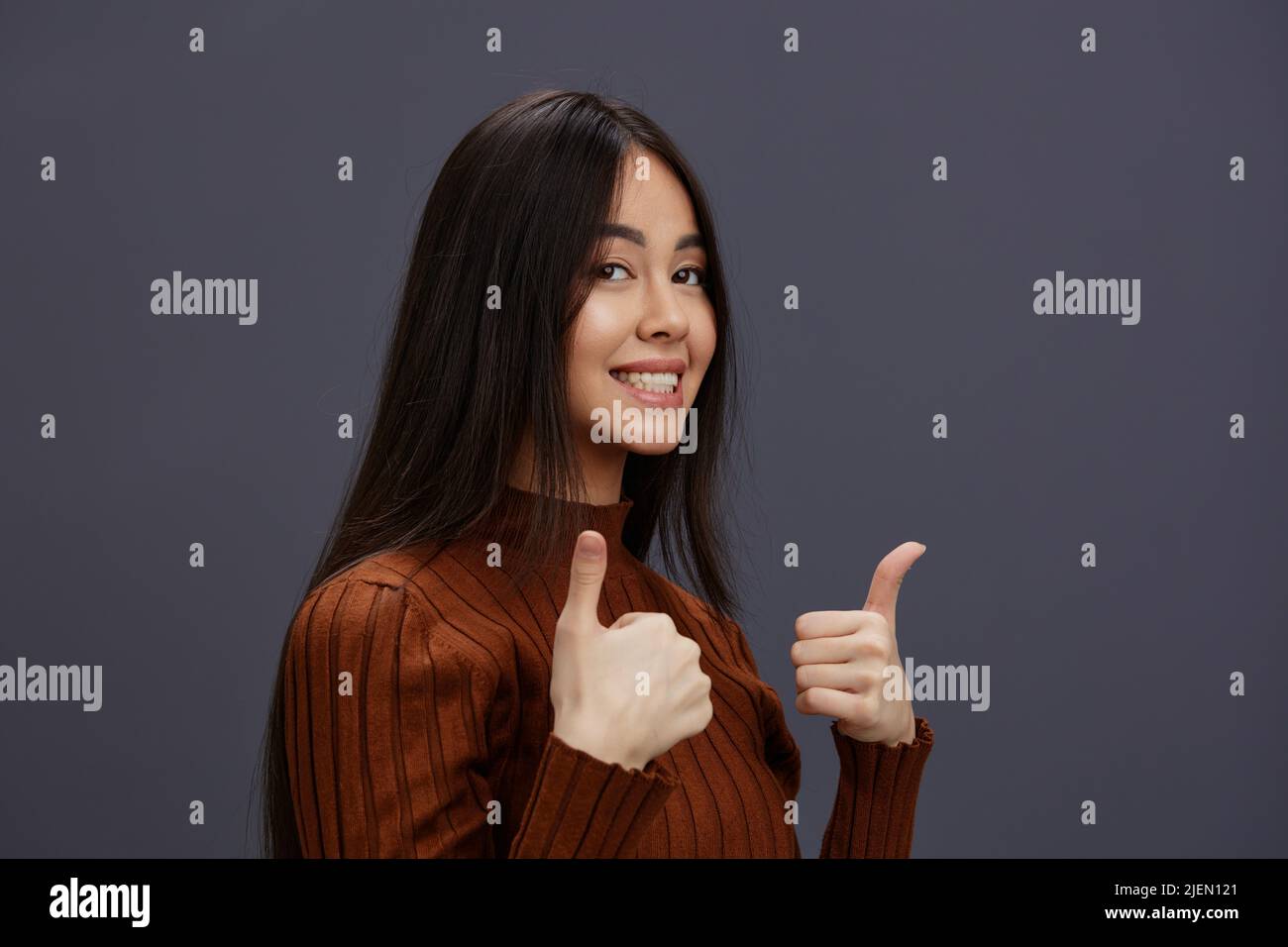 beautiful woman hand gestures brown sweater fashion emotions studio ...