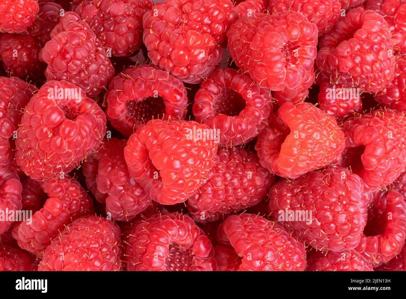 Red raspberry texture background, ripe berries top view Stock Photo - Alamy