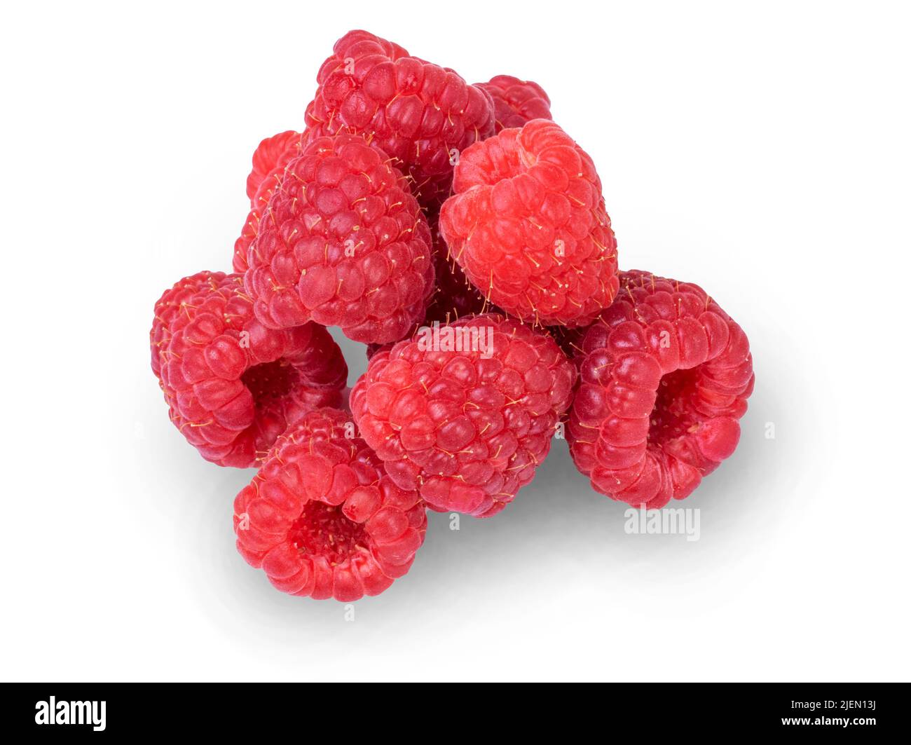 A pile of red raspberries isolated on white Stock Photo - Alamy