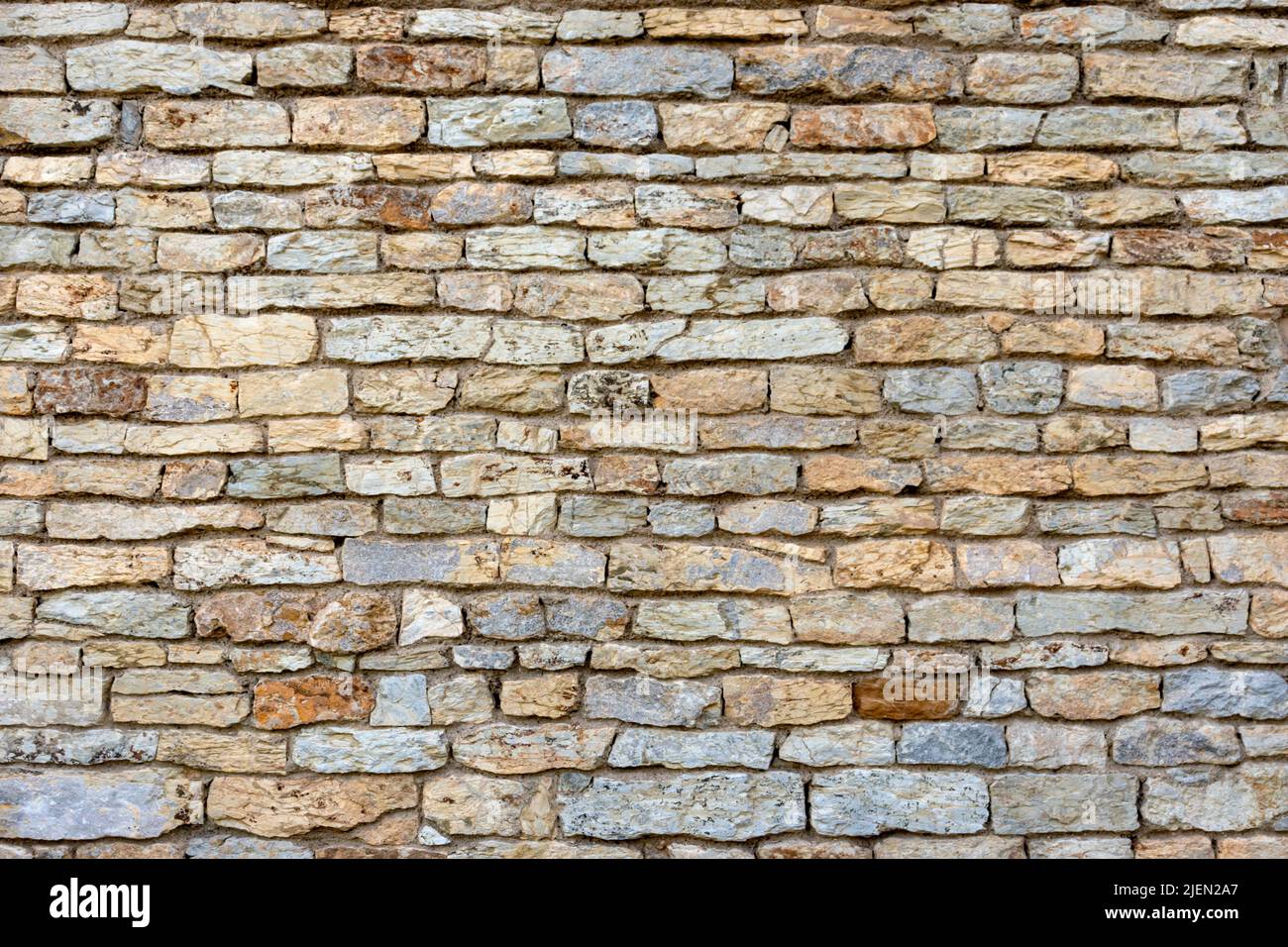 Slate, stone and brick wall texture background of the building or fence ...