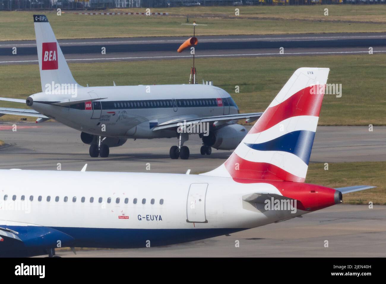 British Airways aircraft, one in BEA colours taxiing and another in ...