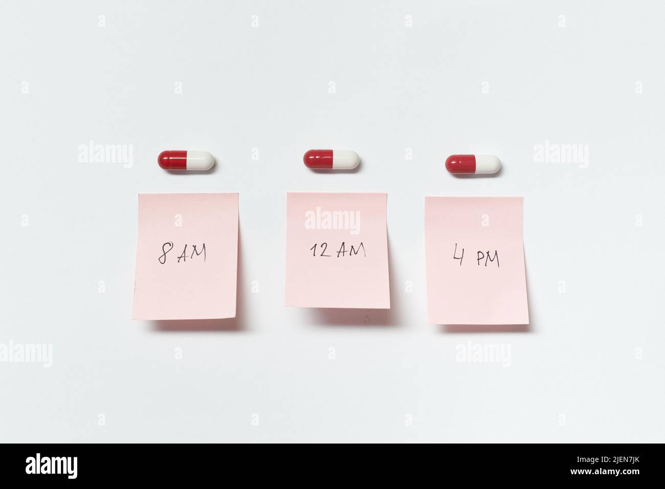 Pharmaceutical pills and medication time notes Stock Photo - Alamy