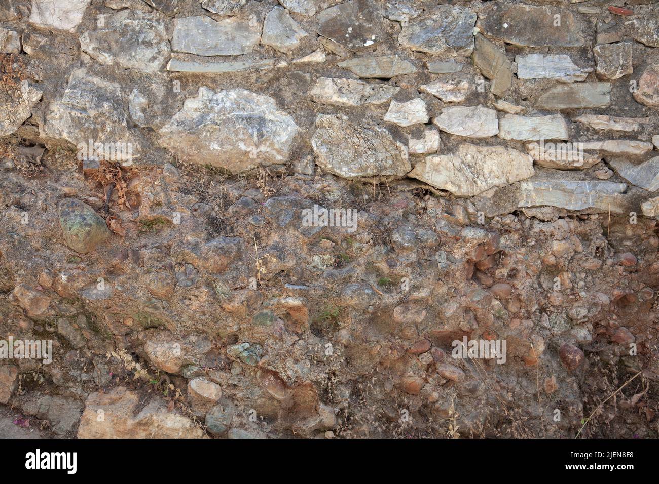 Stonewall was built at different times. A stone wall was rebuilt on the ...