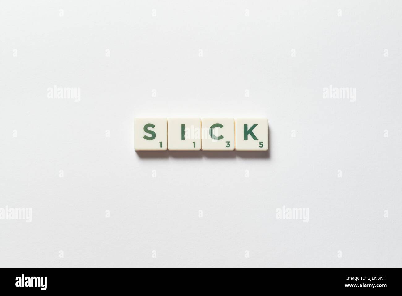 Sick formed of scrabble blocks Stock Photo - Alamy