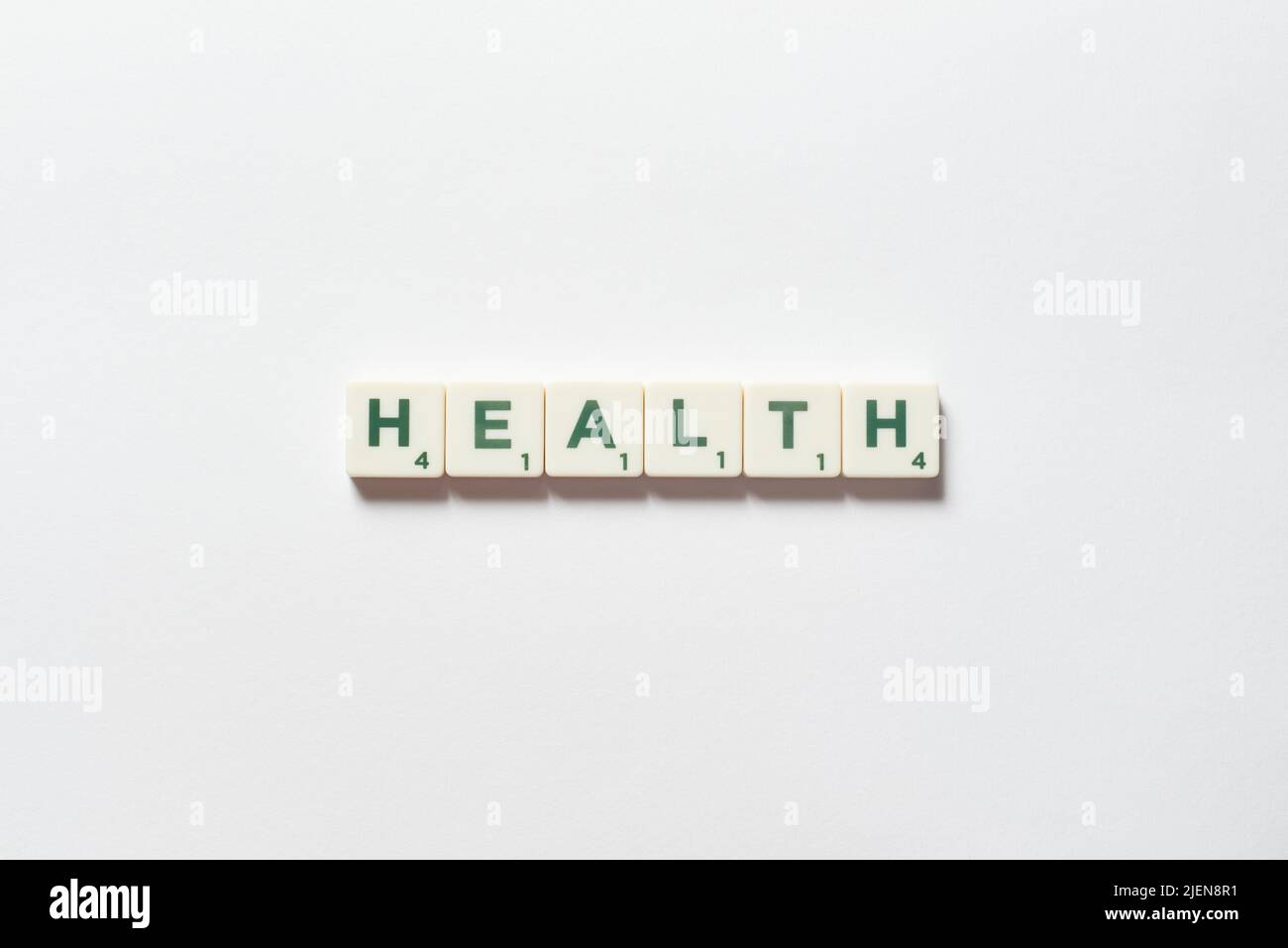 Health formed of scrabble blocks and pharmaceutical pill Stock Photo ...