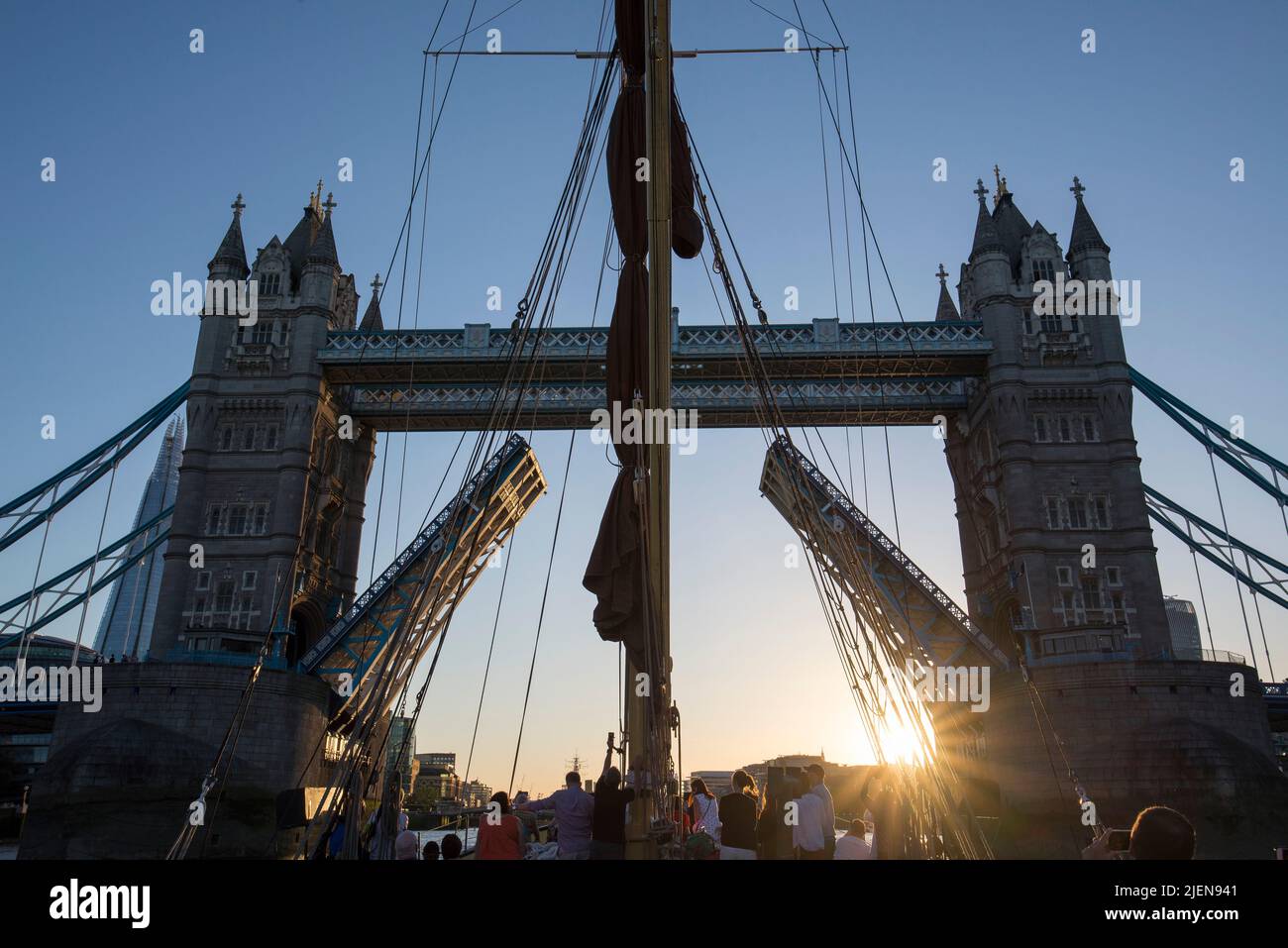 Old sailing barge sailing down the River Thames and under Tower Bridge ...