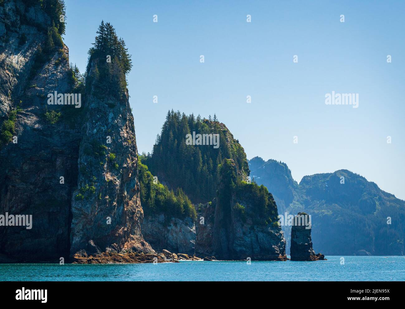Dramatic rocky outcrops in Resurrection Bay near the port of Seward in ...