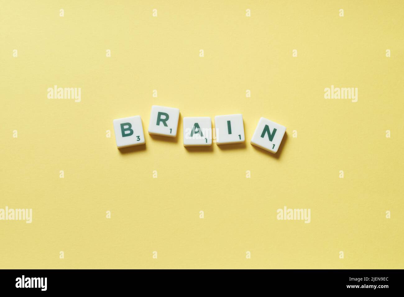 Brain formed of scrabble tiles Stock Photo - Alamy