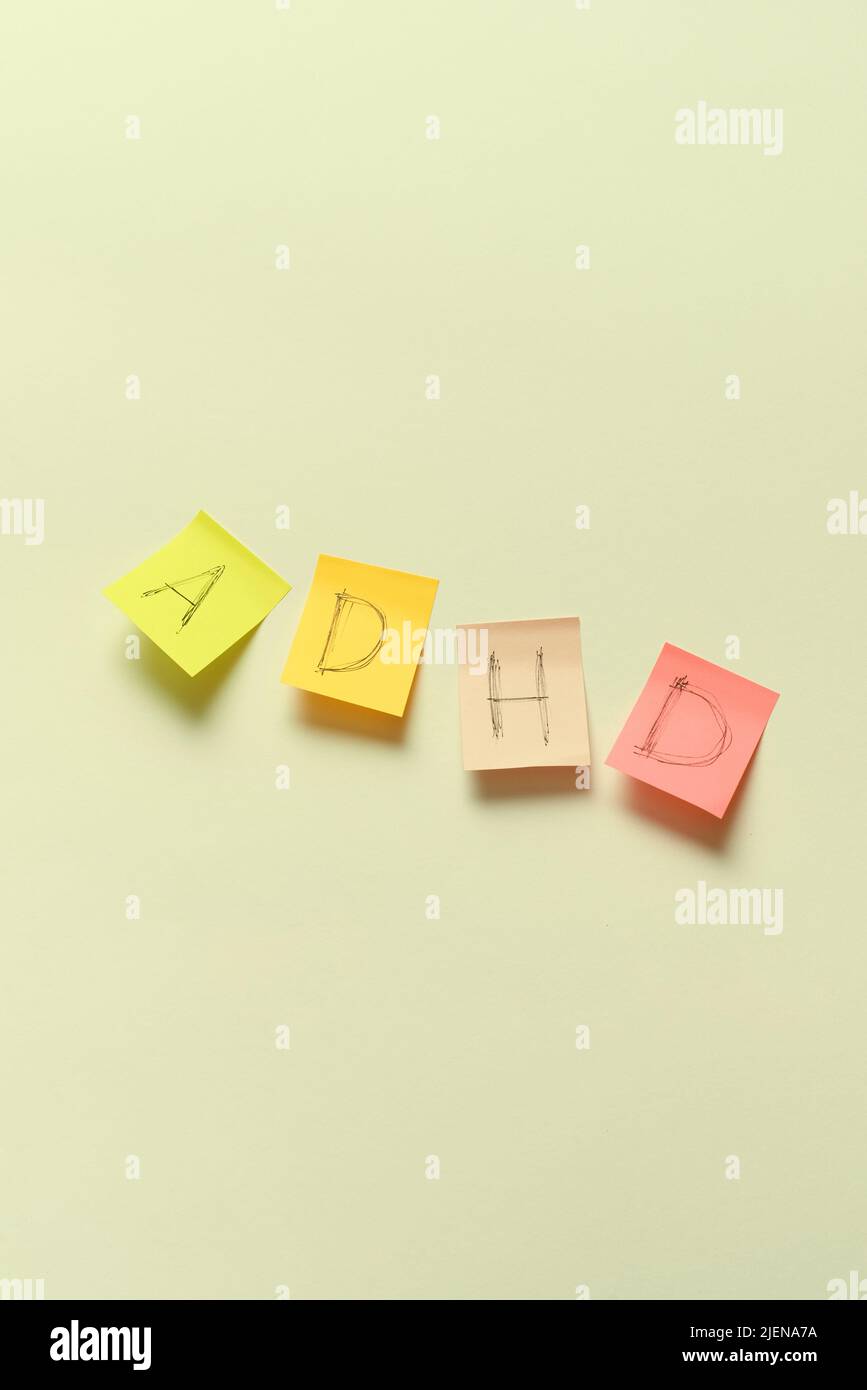 ADHD written on sticky notes Stock Photo - Alamy
