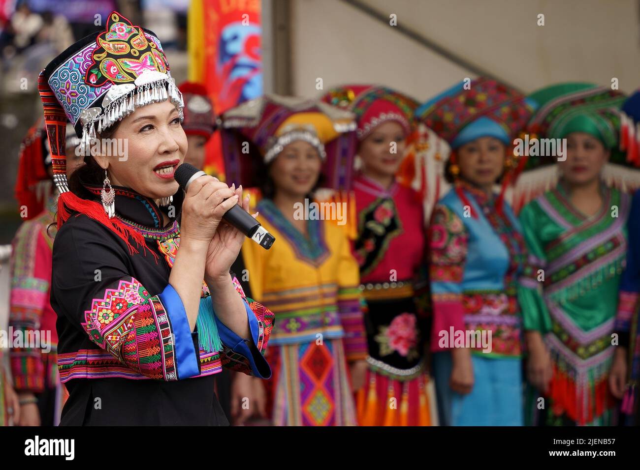 Women in traditional Chinese costume represent each region of China at ...