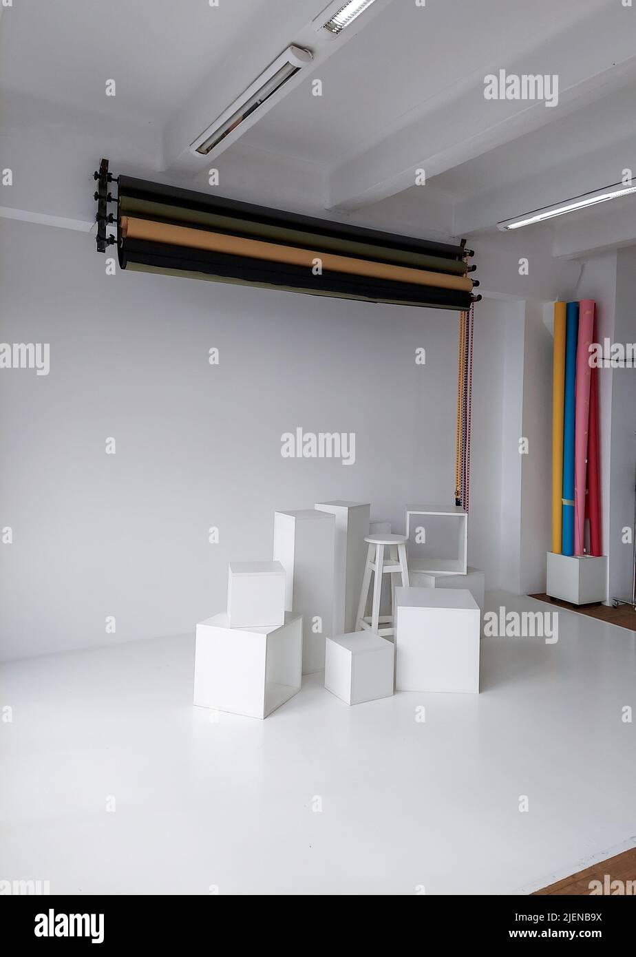 Daylight photo studio interior with set of professional equipment as a ...