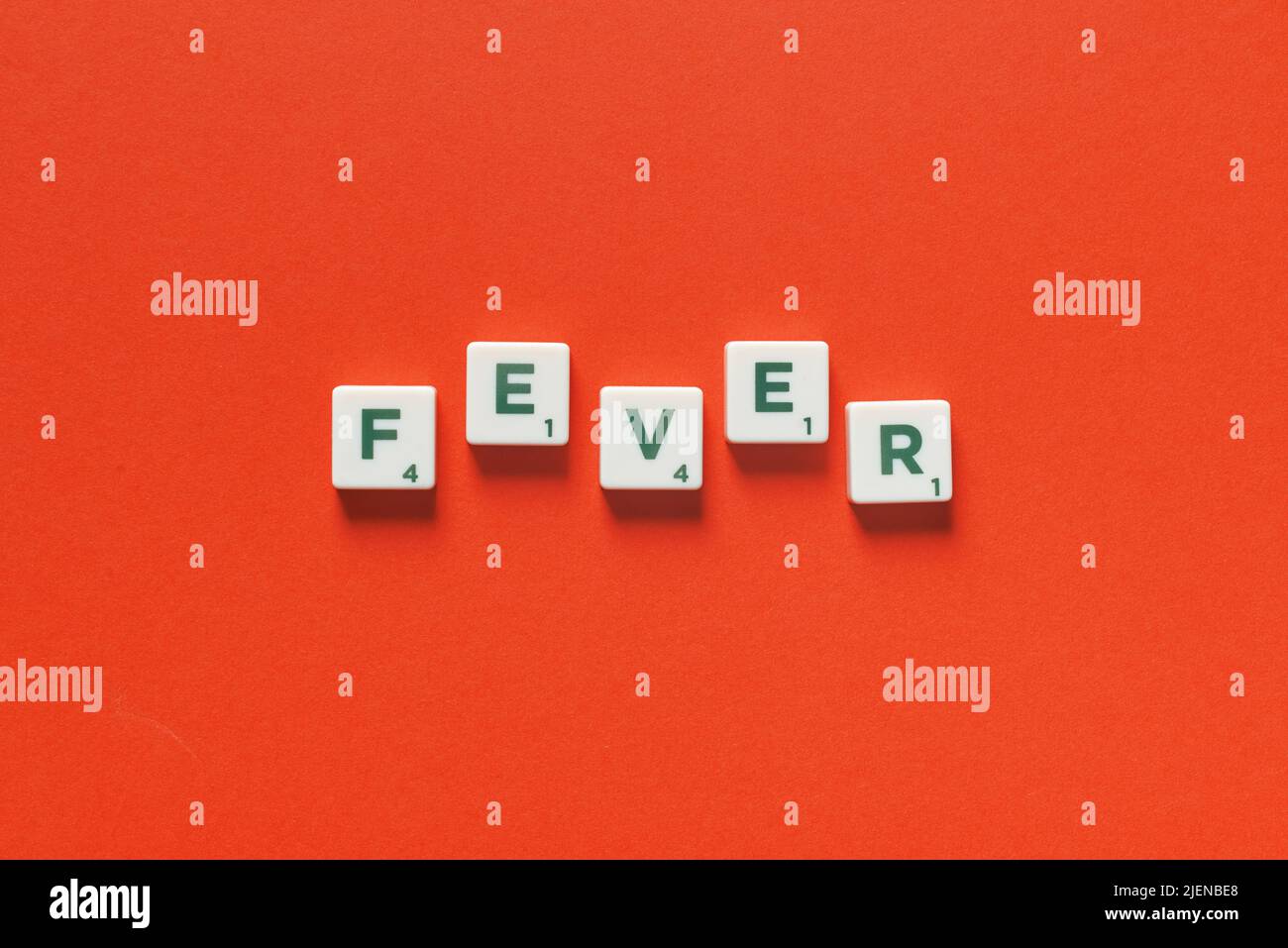 Fever formed of scrabble tiles Stock Photo - Alamy