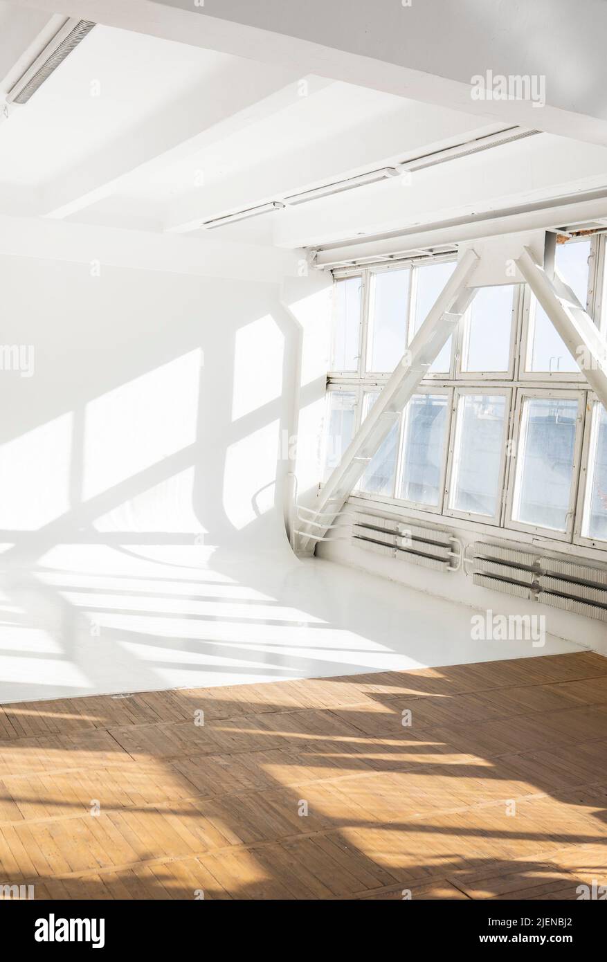 Large sunny photo studio with cyclorama and large panoramic windows ...