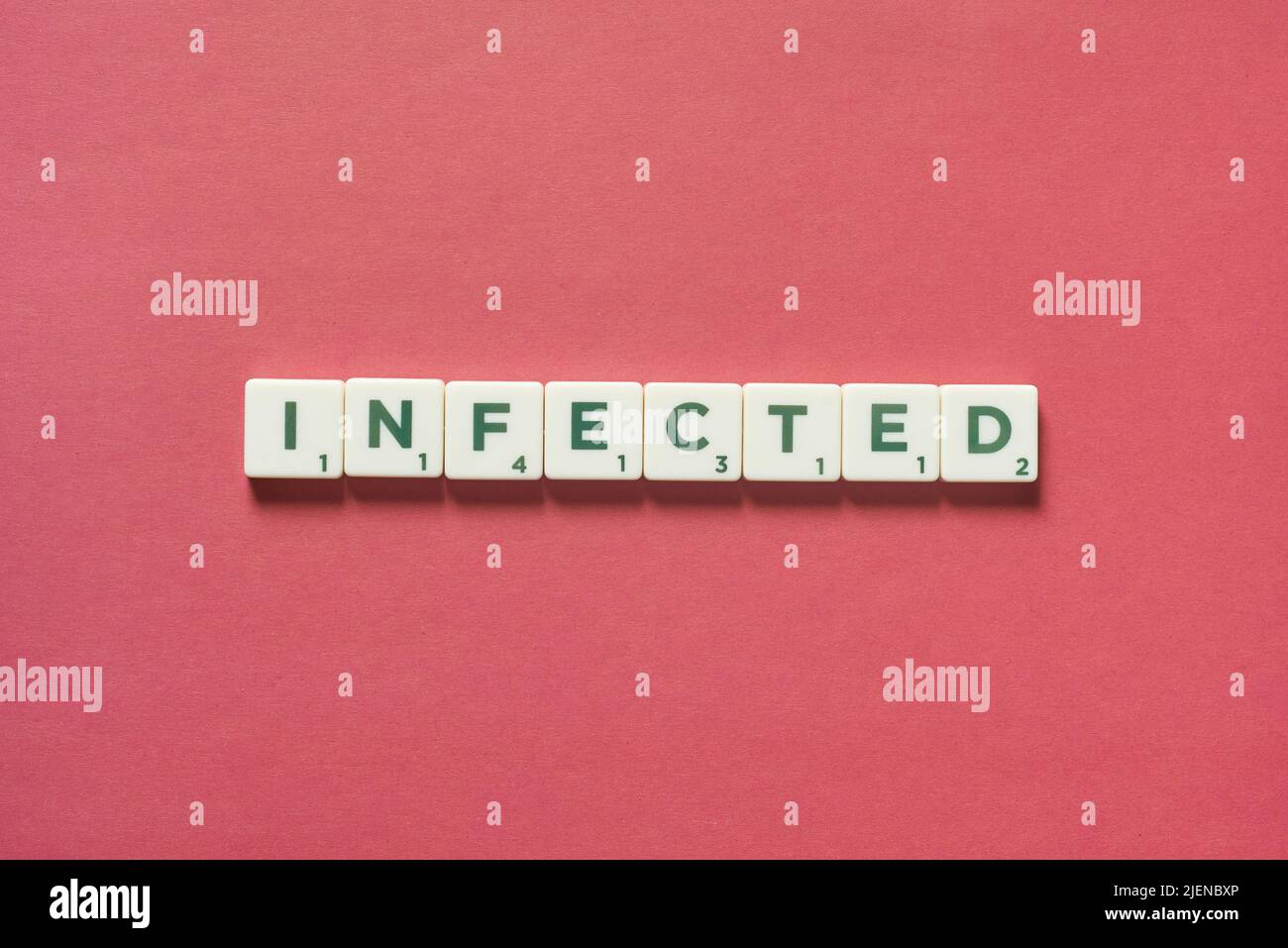 Infected formed of scrabble tiles Stock Photo - Alamy