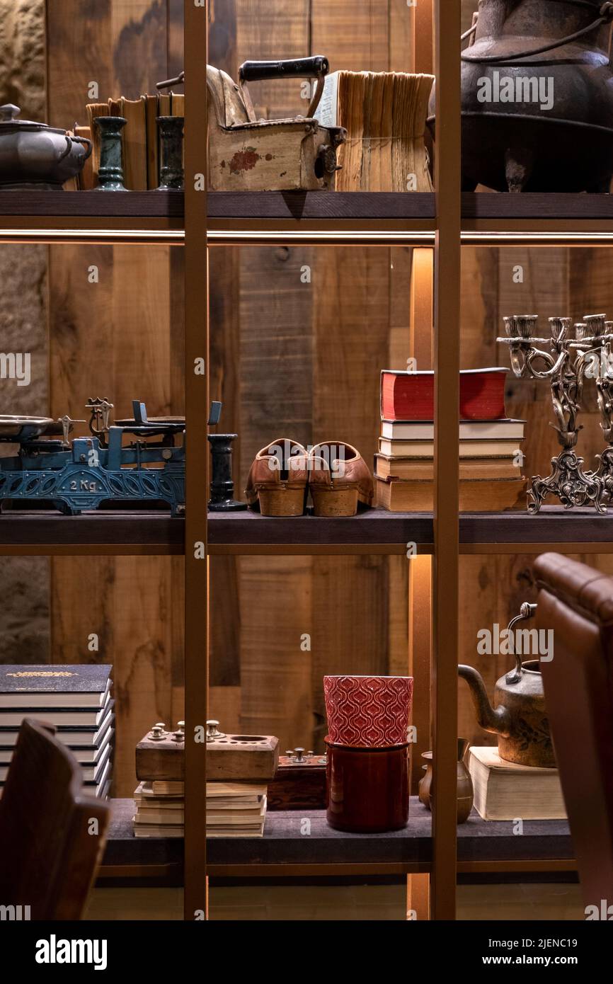 Shelf with vintage objects as decor on wood wall Stock Photo - Alamy