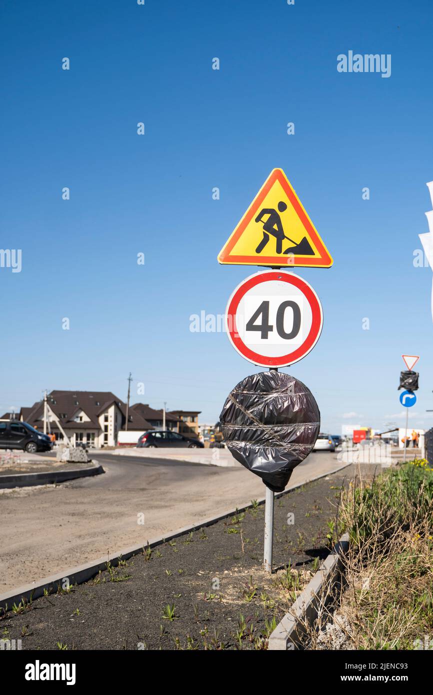 Road marking on the road, warning signs. International traffic signs ...