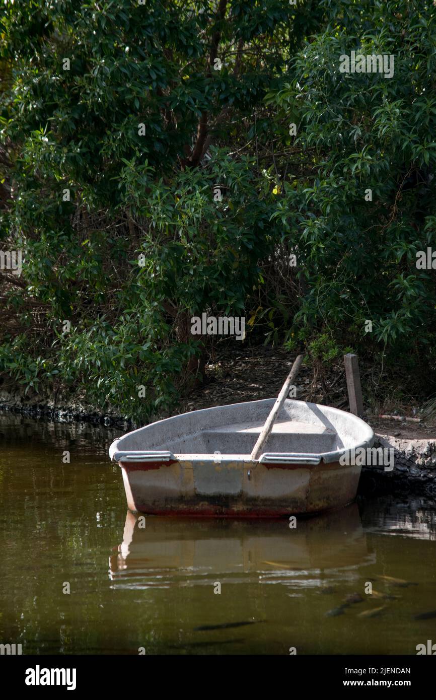 wooden boat in the riverside Stock Photo - Alamy