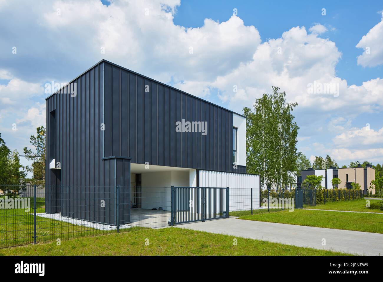 New modern block of flats in green area. residential apartment with ...