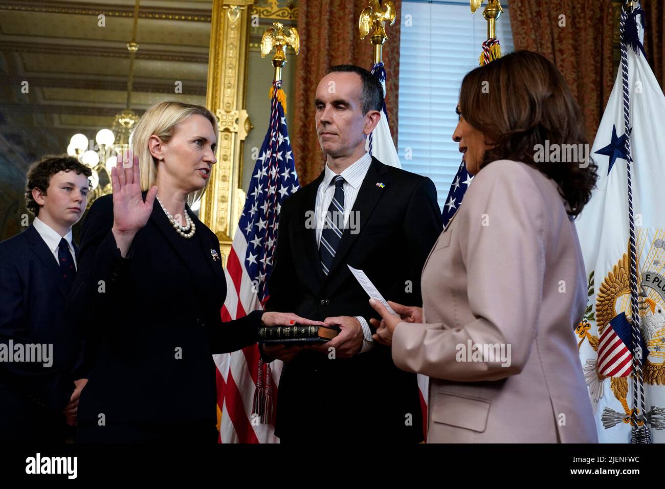 U.S. Vice President Kamala Harris swears in Bridget Brink next to her ...