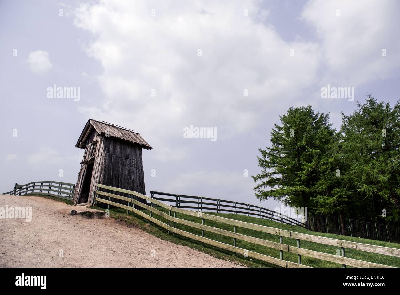Green pastures of sheep ranch landscape at early summer background blue ...