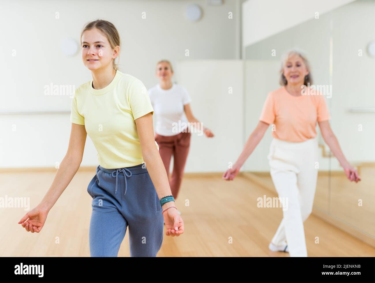 Girl dancing jazz style dance during group training Stock Photo - Alamy
