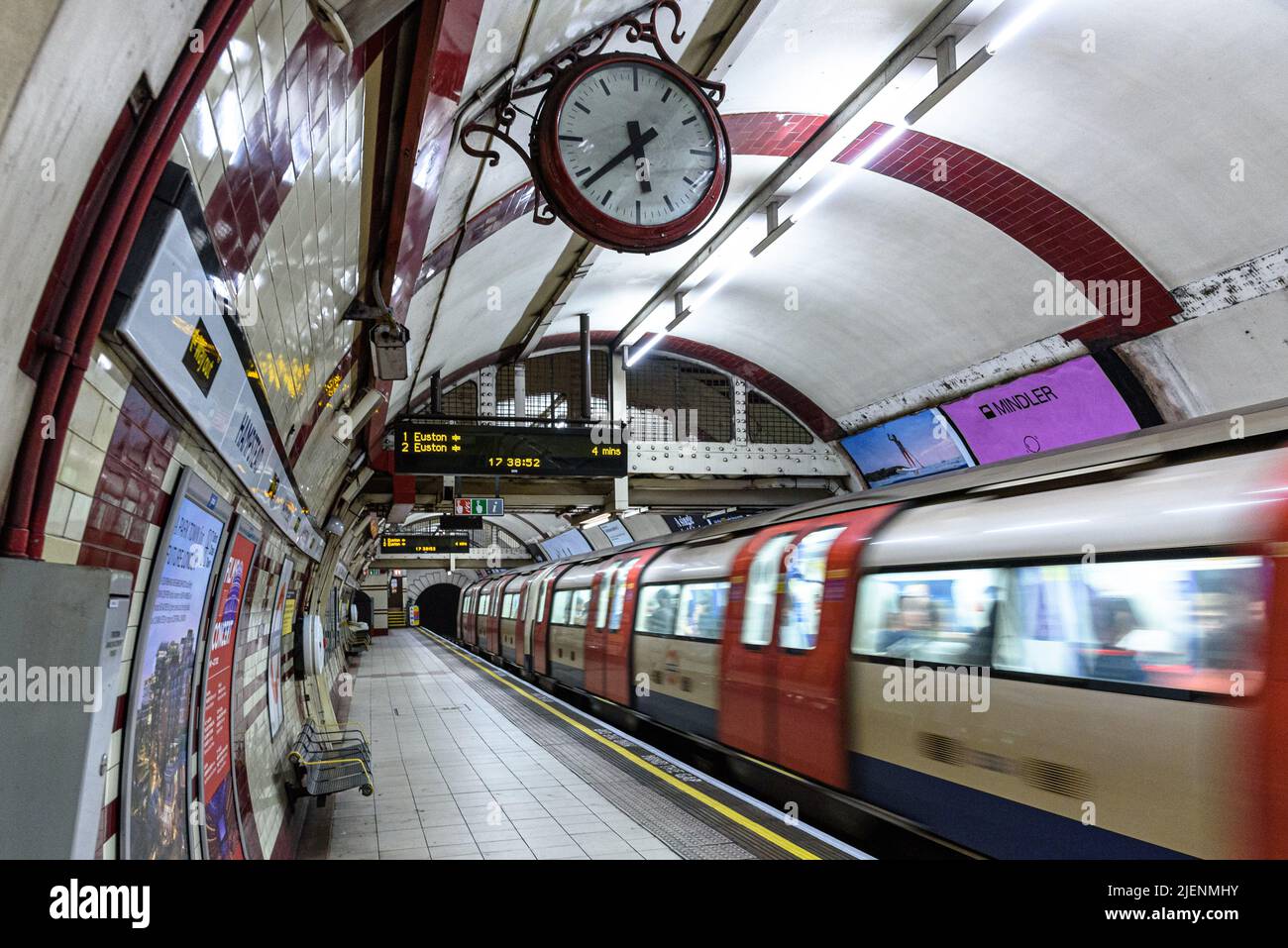 A Northern Line train leaving Hampstead Tube Station Stock Photo - Alamy