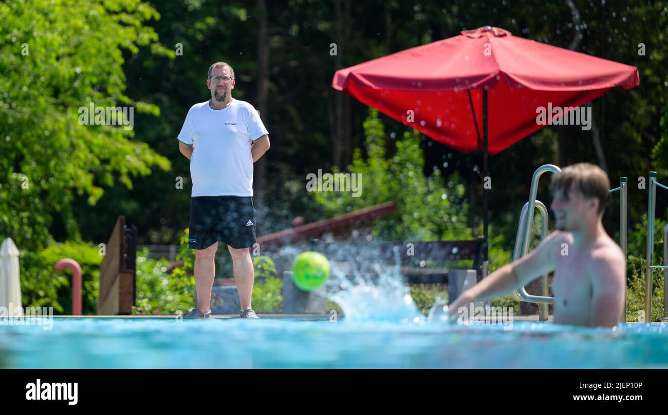 Walsrode, Germany. 24th June, 2022. Florian Herbst, a pool attendant ...