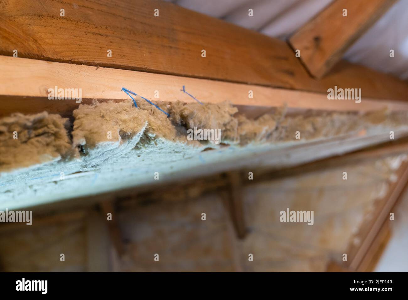 The roof is insulated with mineral wool. Insulation hemming with thread ...