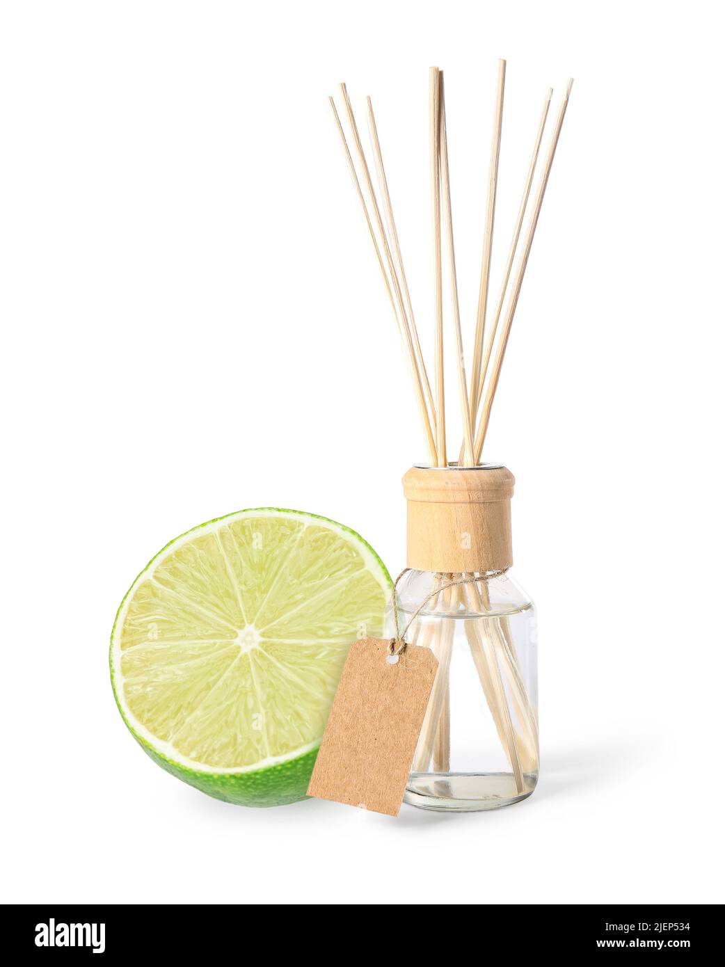 Reed diffuser and lime on white background Stock Photo - Alamy